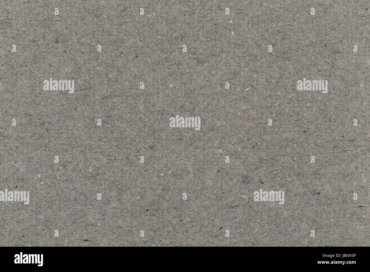 Dense cardboard paper closeup texture or background Stock Photo - Alamy