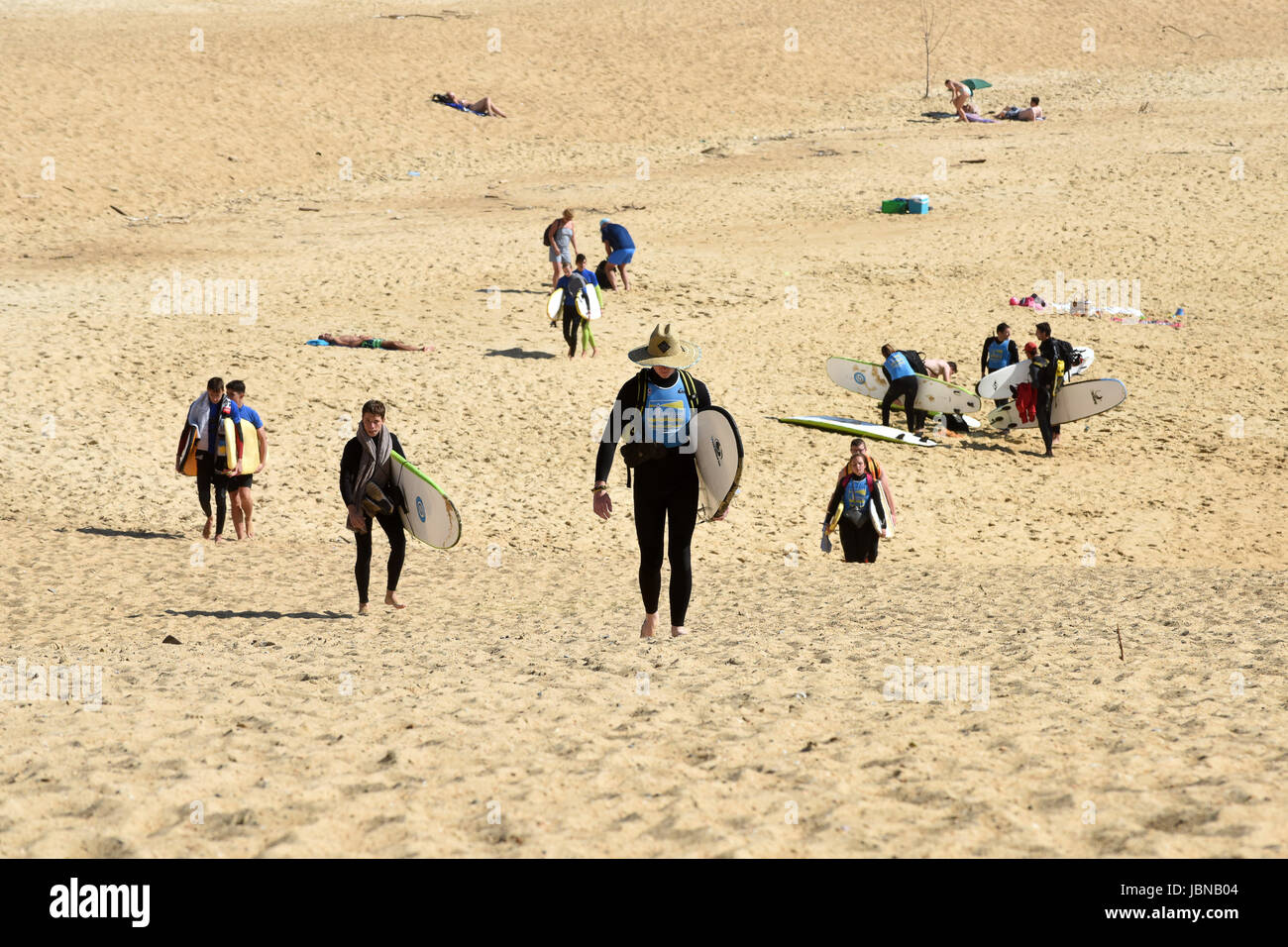 Surfers leaving Capbreton beach in South Western France Stock Photo - Alamy