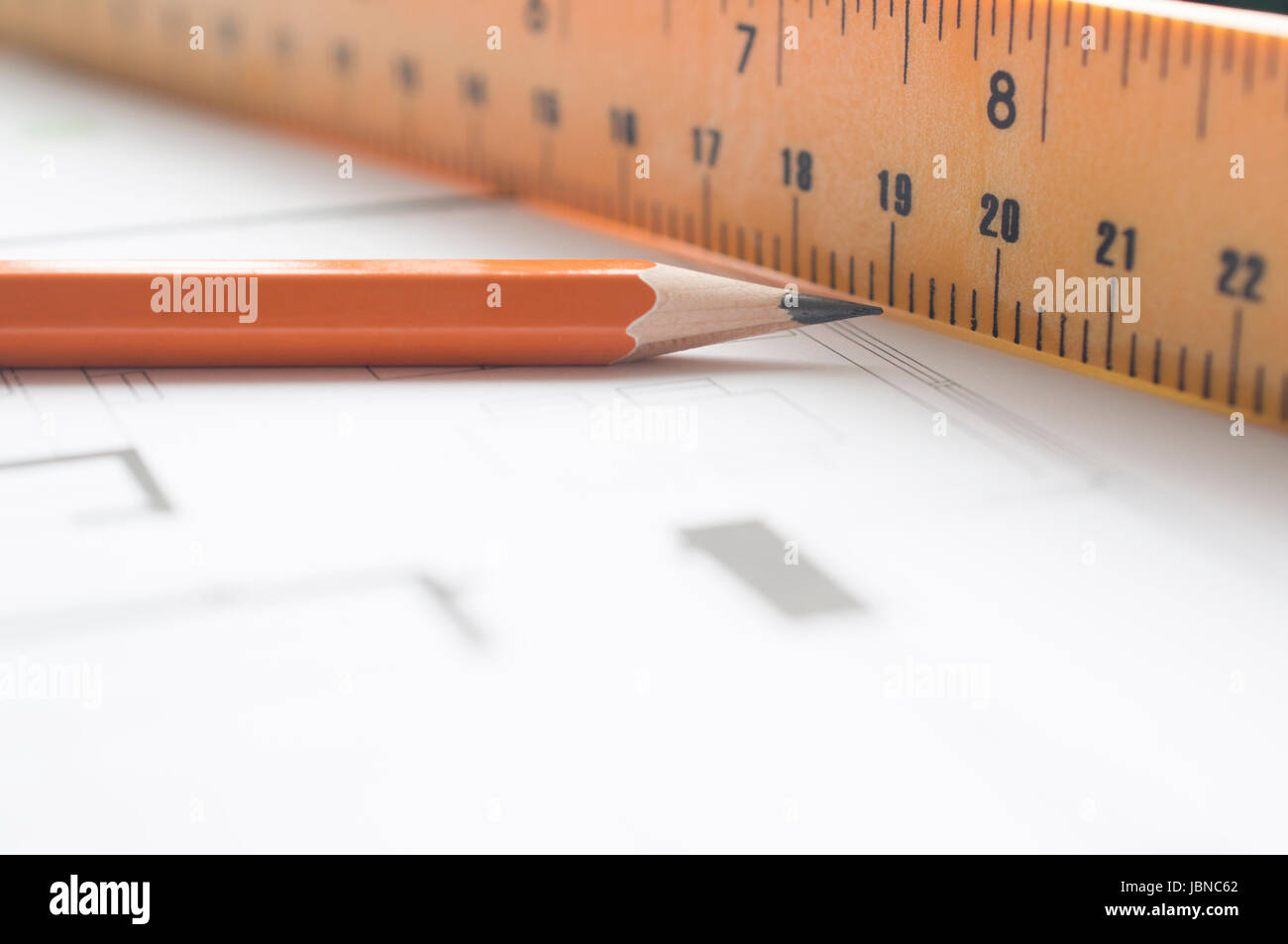Level and pen on an architects plan Stock Photo - Alamy