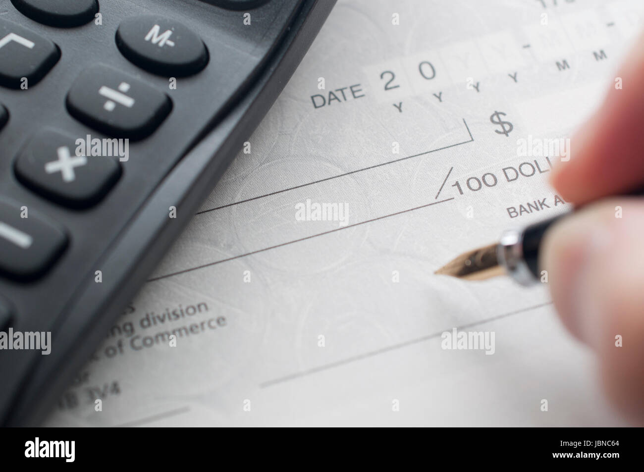 Business woman prepare writing a check Stock Photo - Alamy