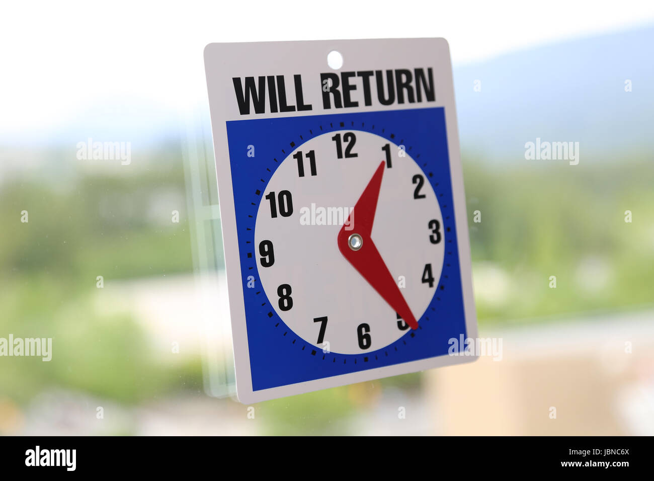 will return sign with nature background Stock Photo - Alamy
