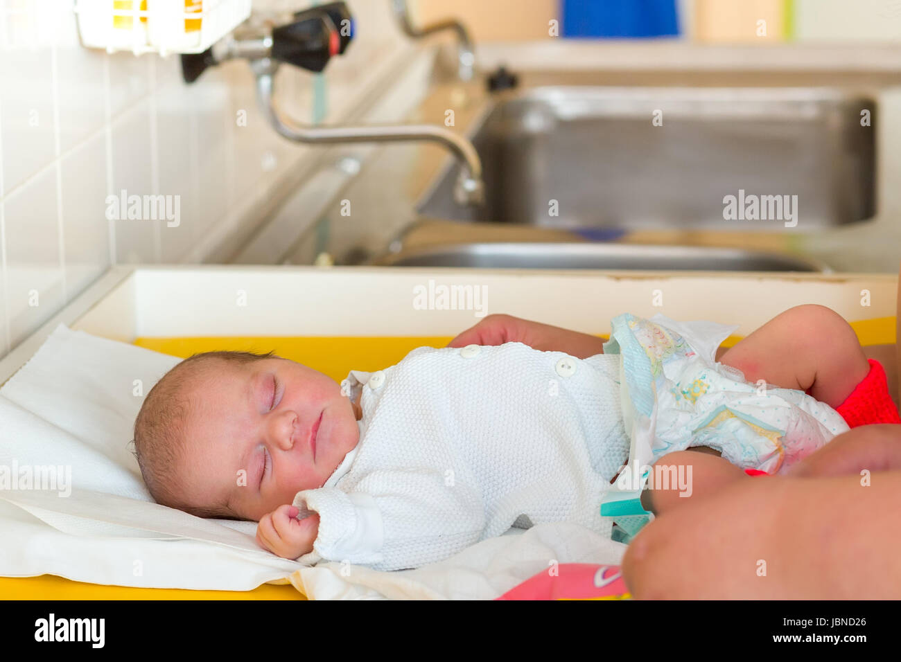 sleeping newborn baby in the hospital - the first hours of the new life ...