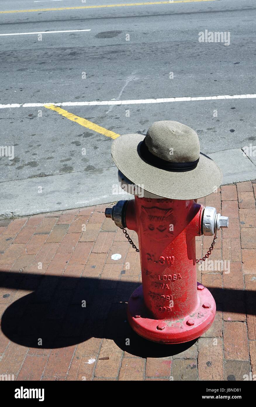 Wide-brimmed hat on a fire hydrant, Chapel Hill, North Carolina Stock ...