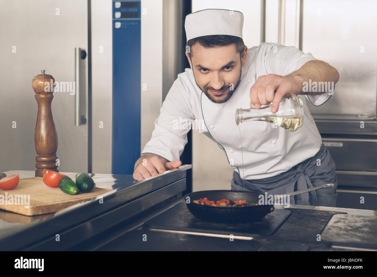 Man japanese restaurant chef cooking in the kitchen Stock Photo - Alamy