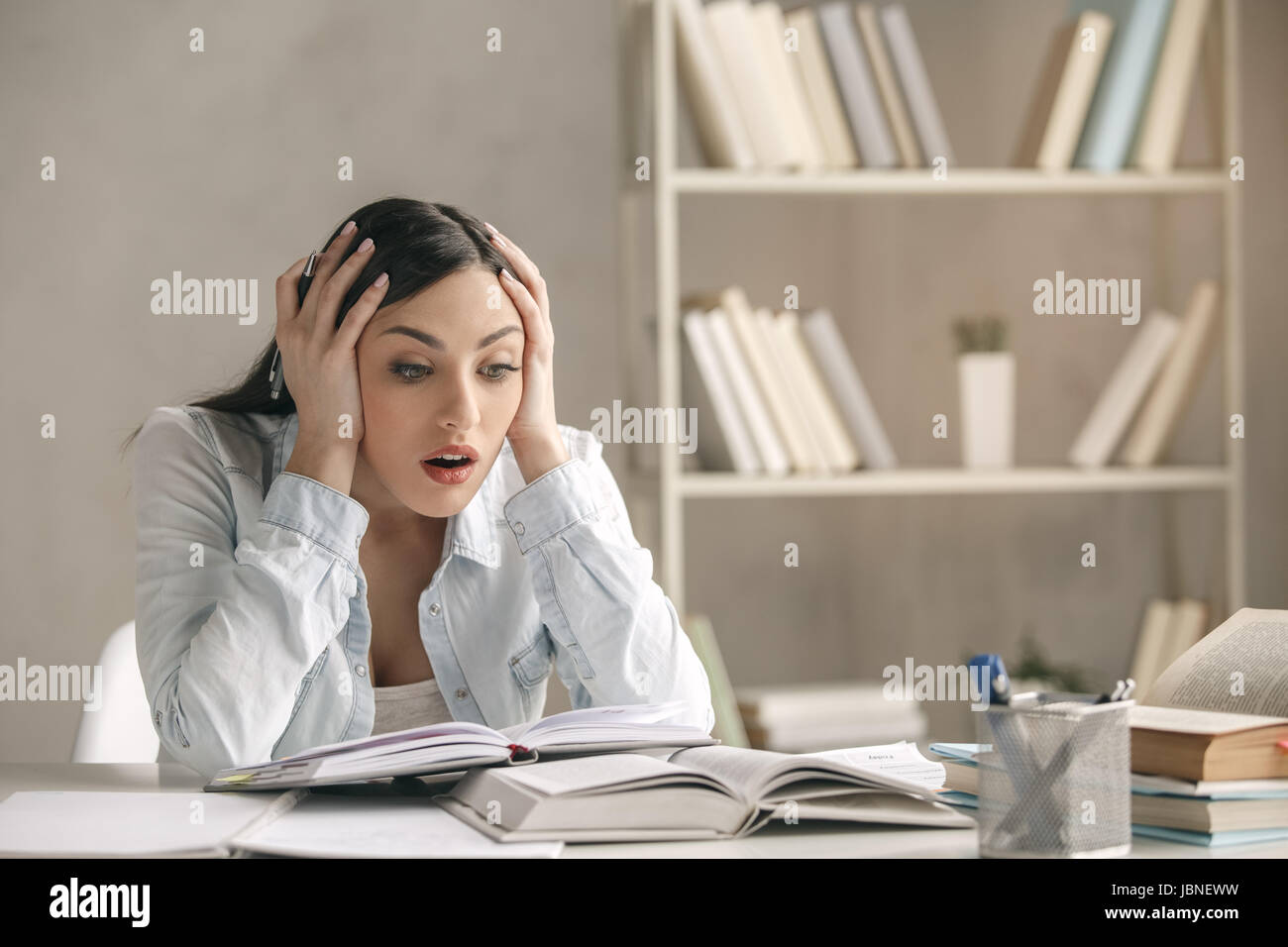 Young woman study at home alone education Stock Photo - Alamy
