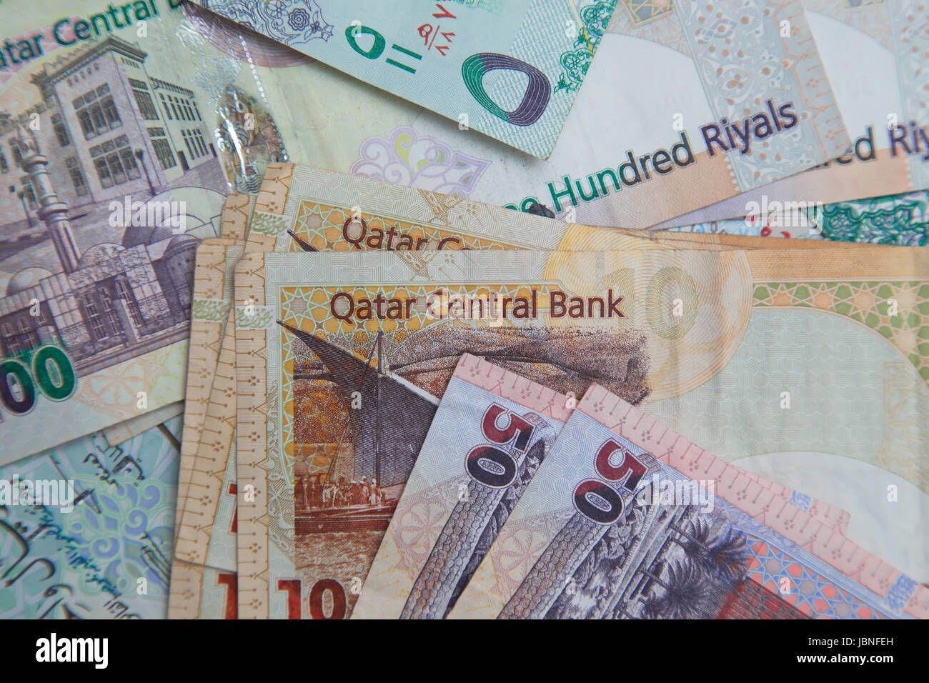 Qatari paper currency, riyal, closeup Stock Photo - Alamy