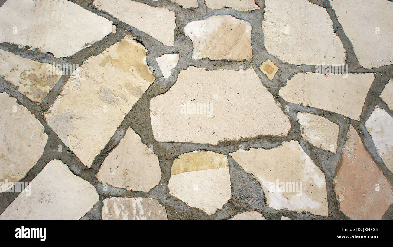 Texture of rough natural stones with cement joints Stock Photo - Alamy