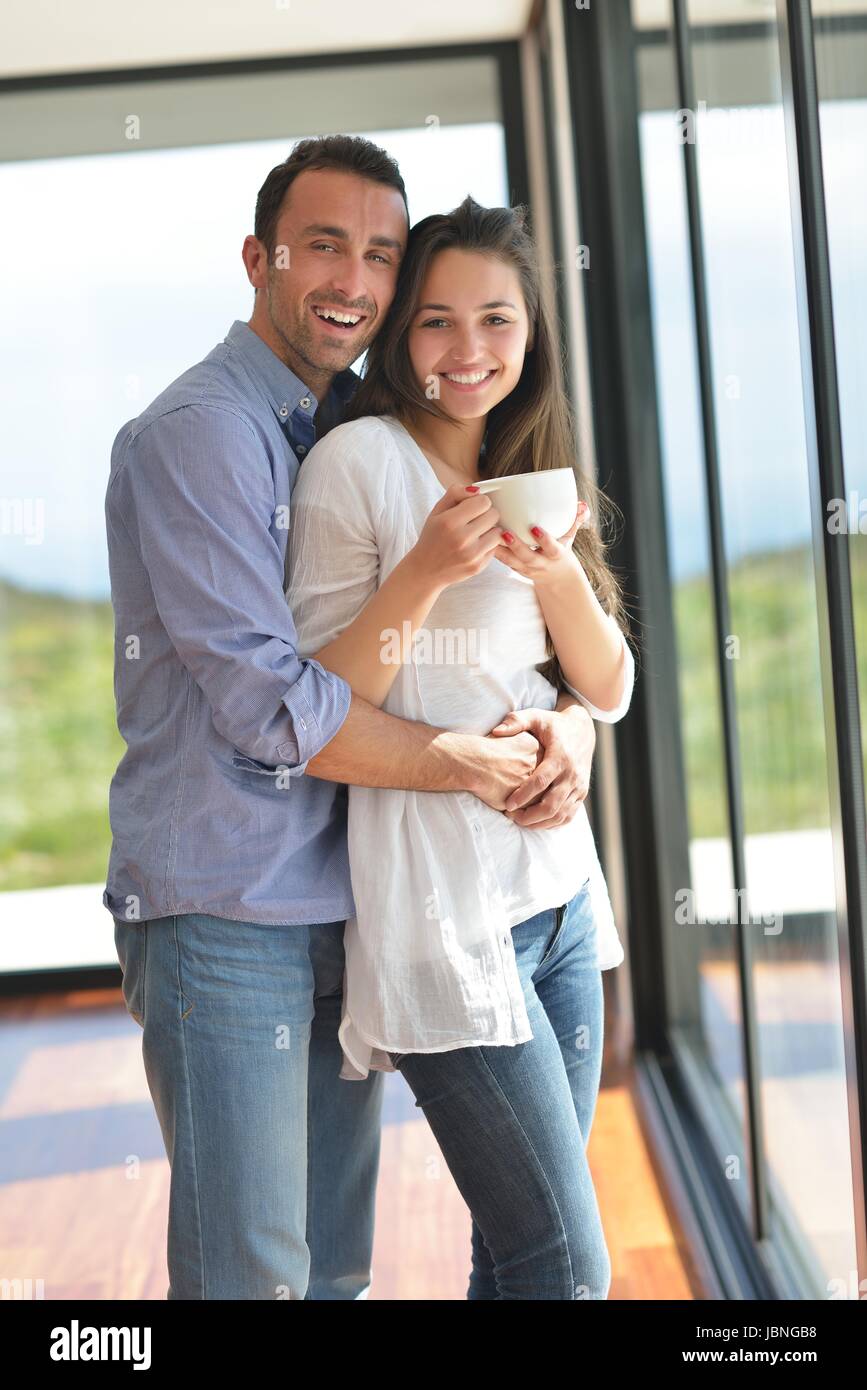 romantic happy young couple relax at home Stock Photo - Alamy