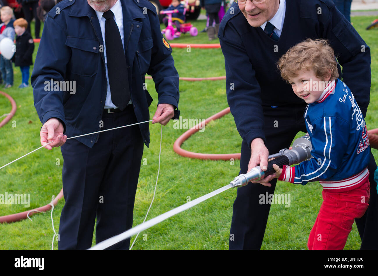 Fire hydrant child hi-res stock photography and images - Alamy
