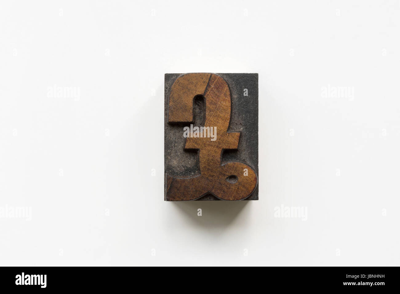 Old letterpress pound sign printing block isolated on a white ...