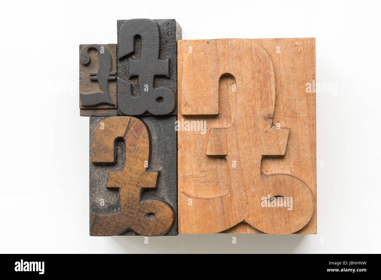 Old letterpress pound sign printing blocks isolated on a white ...