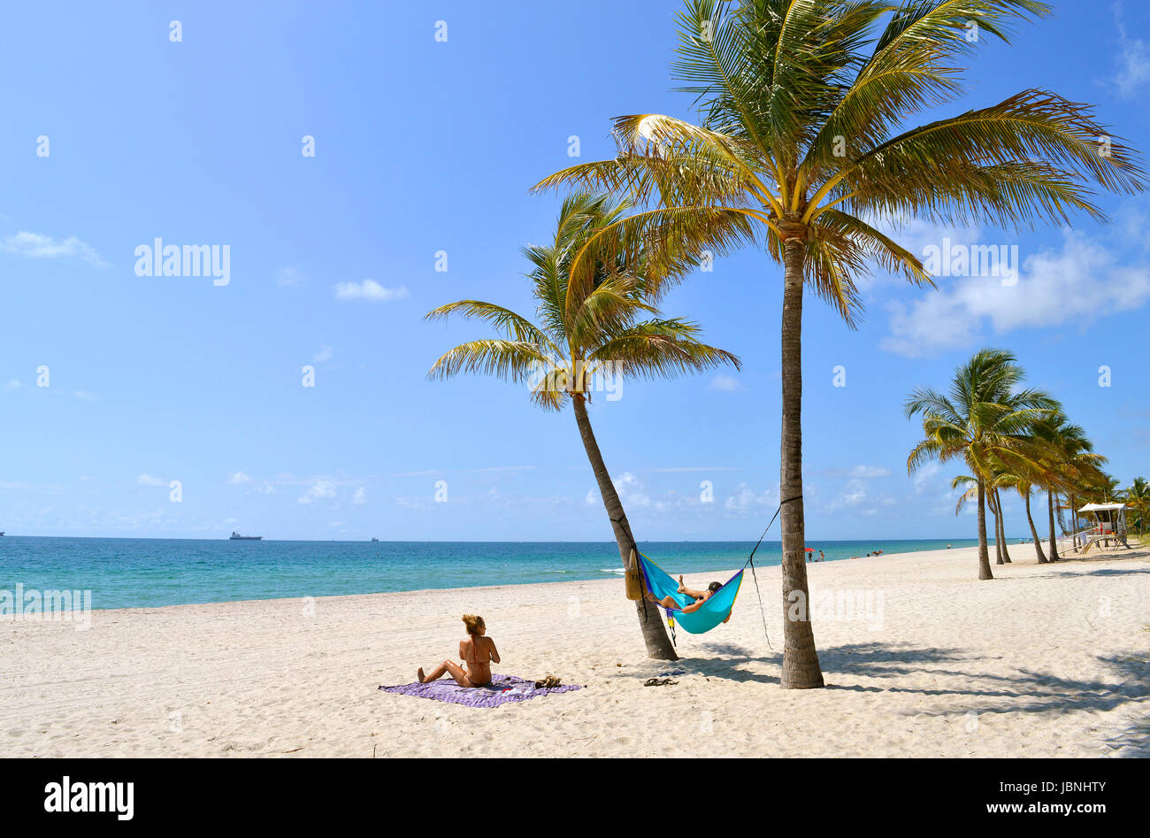 Couple sunbathing enjoying sun hi-res stock photography and images - Alamy