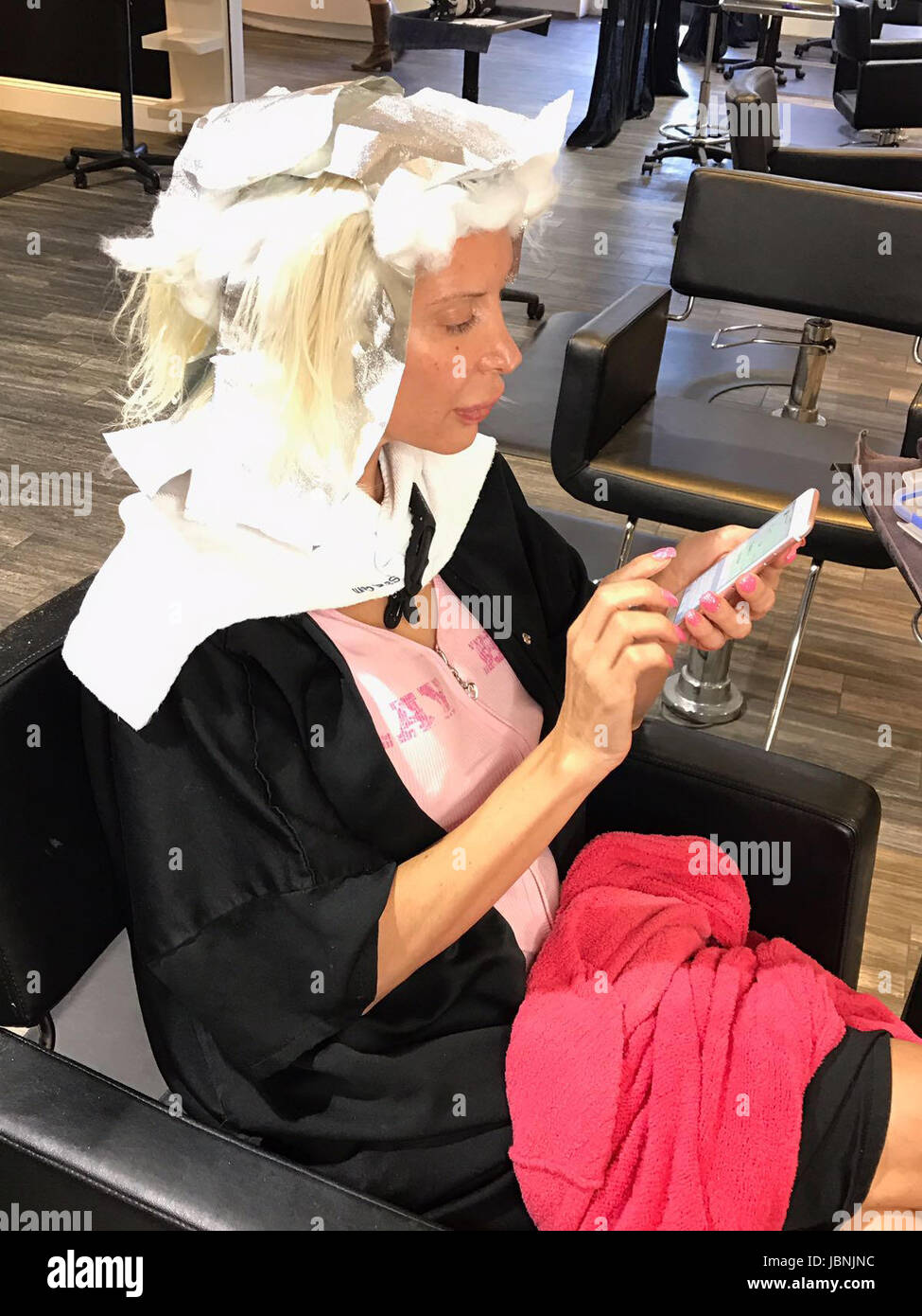 Celebrity hairdresser zach mesquit bleaches hi-res stock photography ...