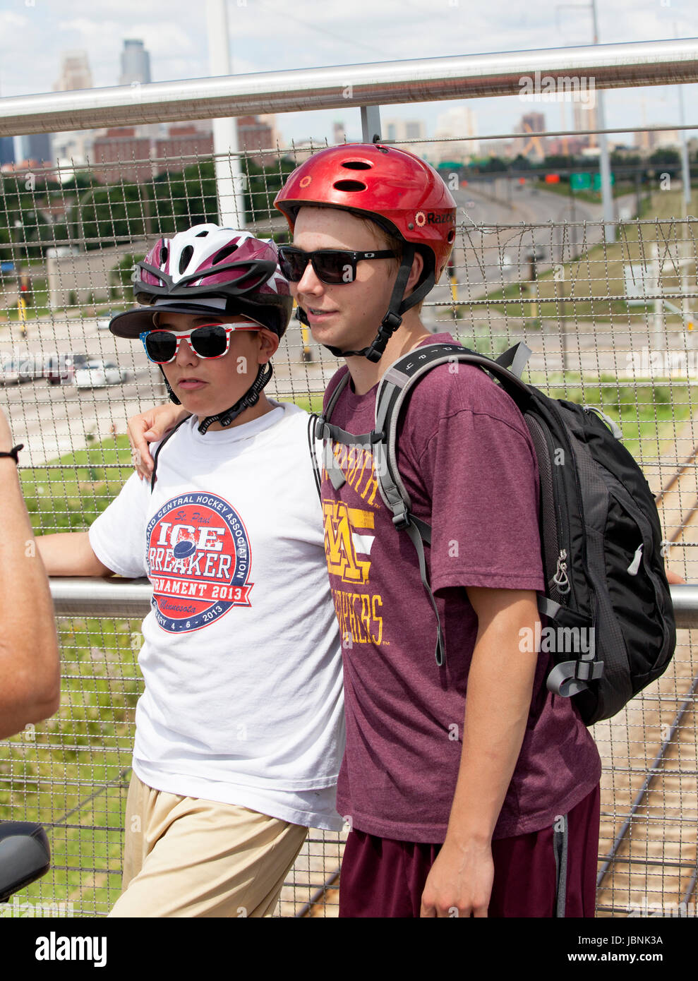 Two brothers together on the Martin Olav Sabo bicycle Bridge ...