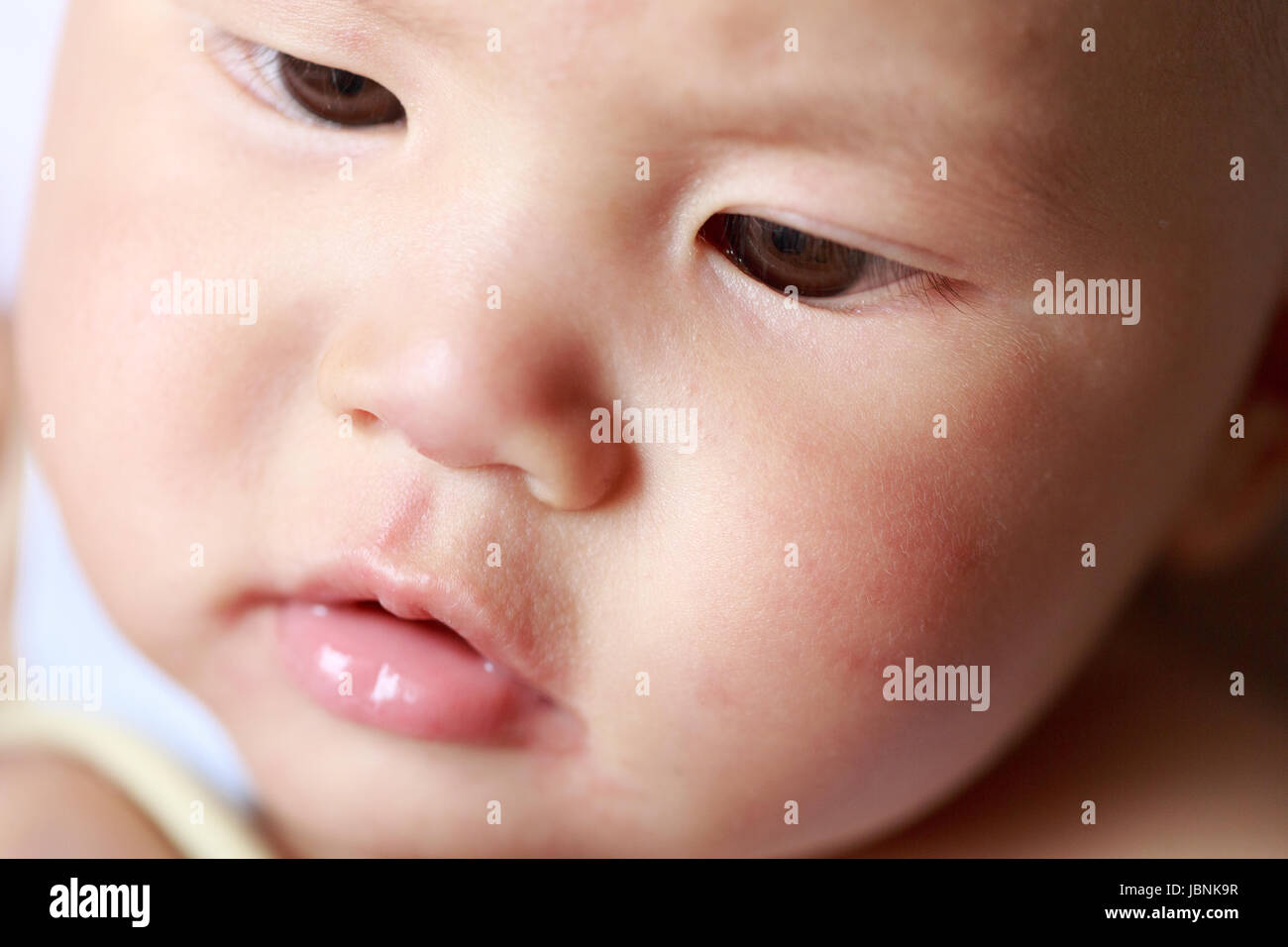 A baby's facial features; a curious expression Stock Photo - Alamy