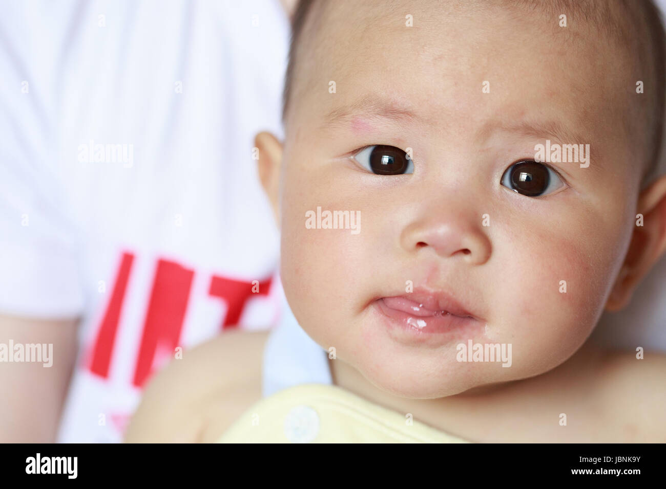 A baby's facial features; a curious expression Stock Photo - Alamy