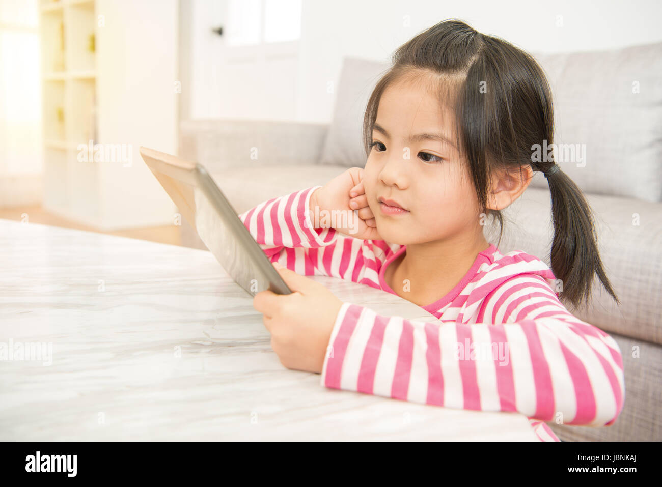 Kids watching cartoon hi-res stock photography and images - Alamy