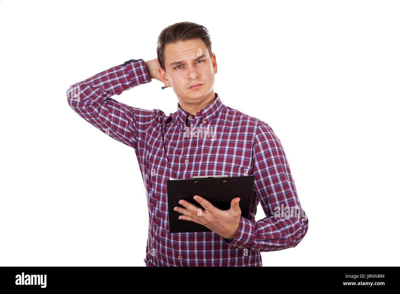 Picture of a tired young man holding insurance forms on isolated ...