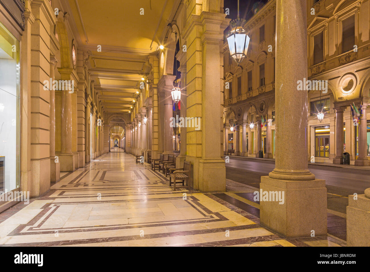 Turin - The porticoes of of Via roma street at dusk Stock Photo - Alamy