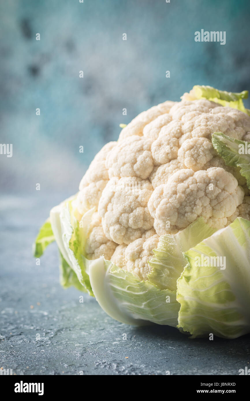 Organic cauliflower on gray background Stock Photo - Alamy