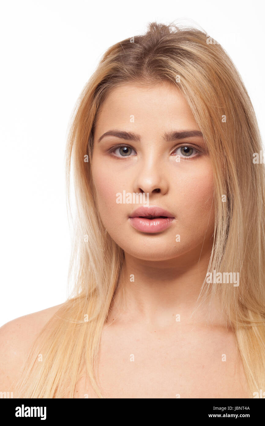 A bit overweight girl on white background in studio photo Stock Photo ...