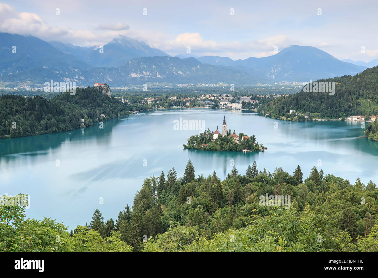 Aerial view of lake Bled at sunset with a view of the island church and ...
