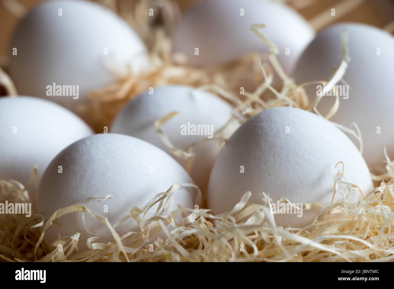 Fresh white uncooked eggs - simple natural rustic background Stock ...