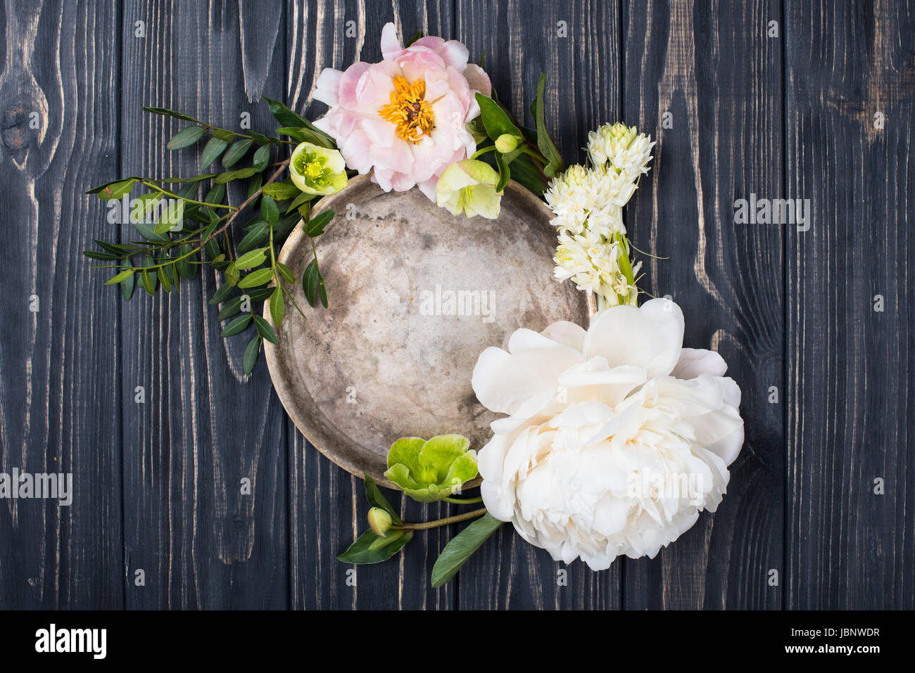 peony flowers arrangement on old wooden board background. Festiv Stock ...