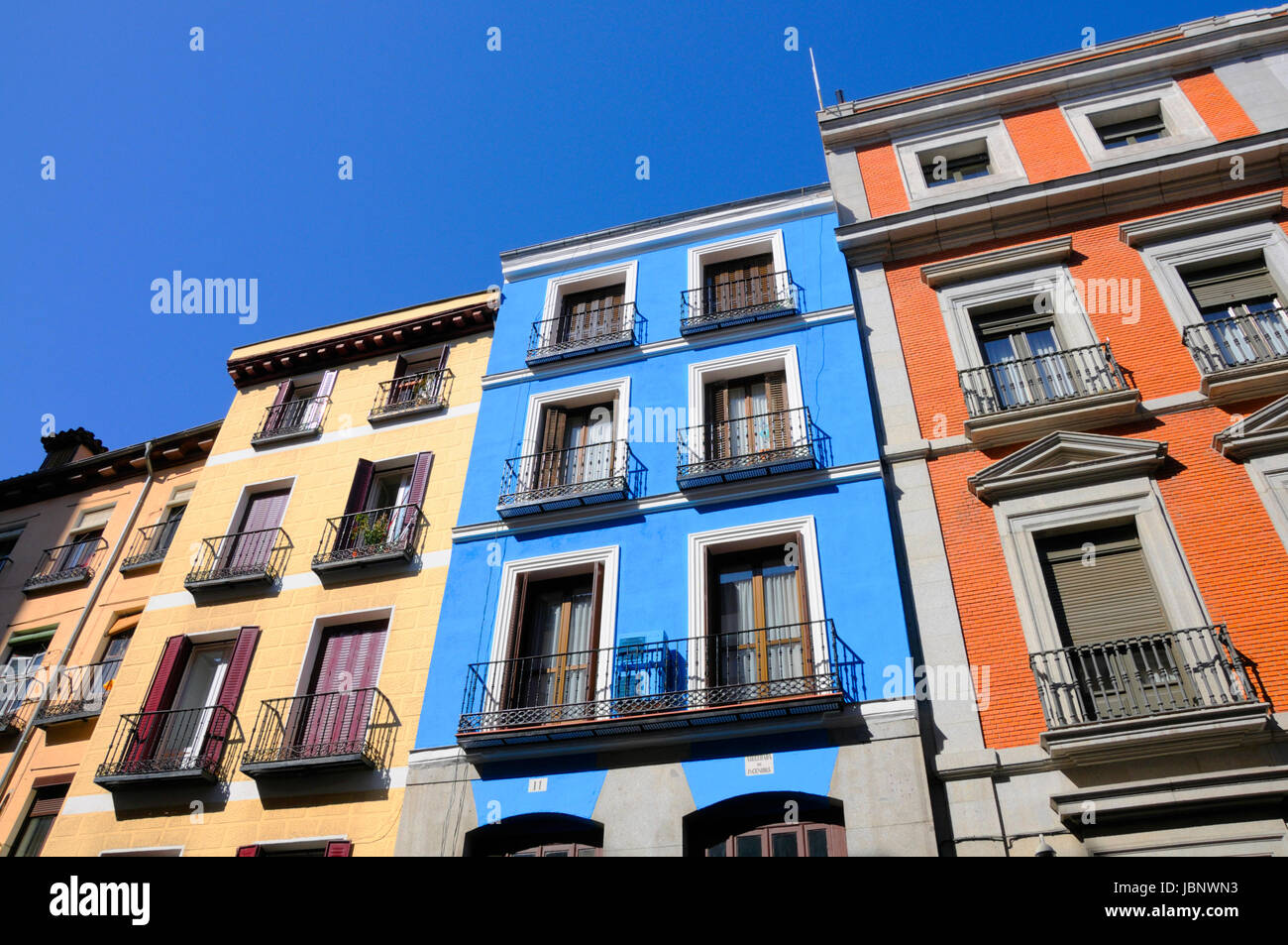 Madrid, Spain. Colourful house facades on Calle Mayor Stock Photo - Alamy