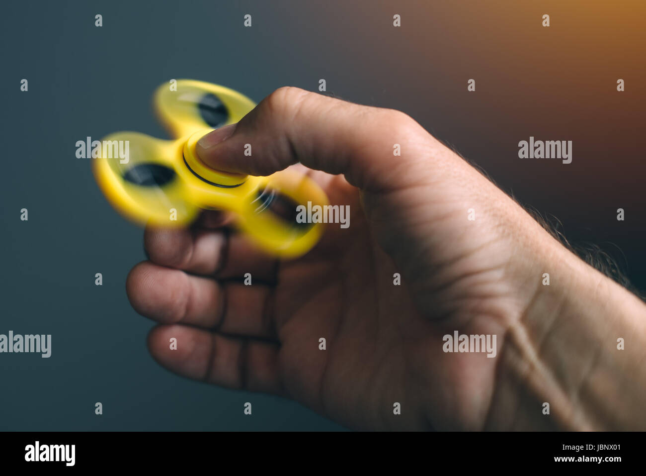 Rotating fidget spinner hi-res stock photography and images - Alamy