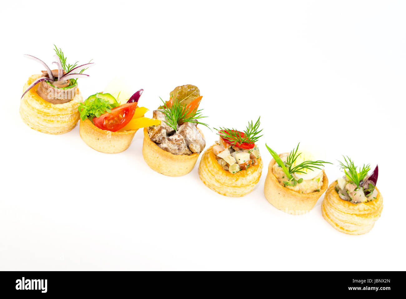 Mini Canape with meat and vegetables in plastic cups Stock Photo - Alamy