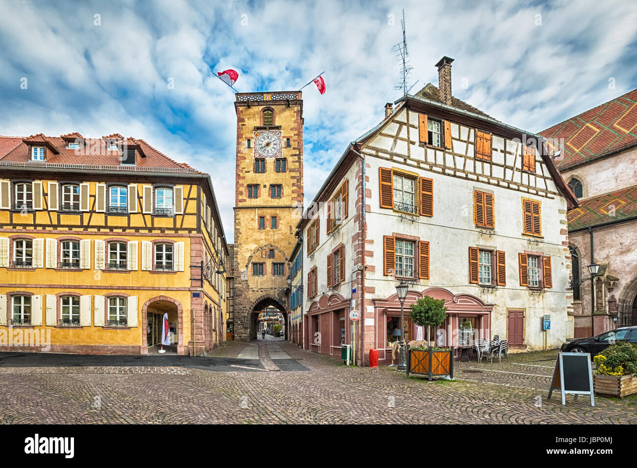 HDR-image of historical clock tower with gate in Ribeauville, Alsace ...