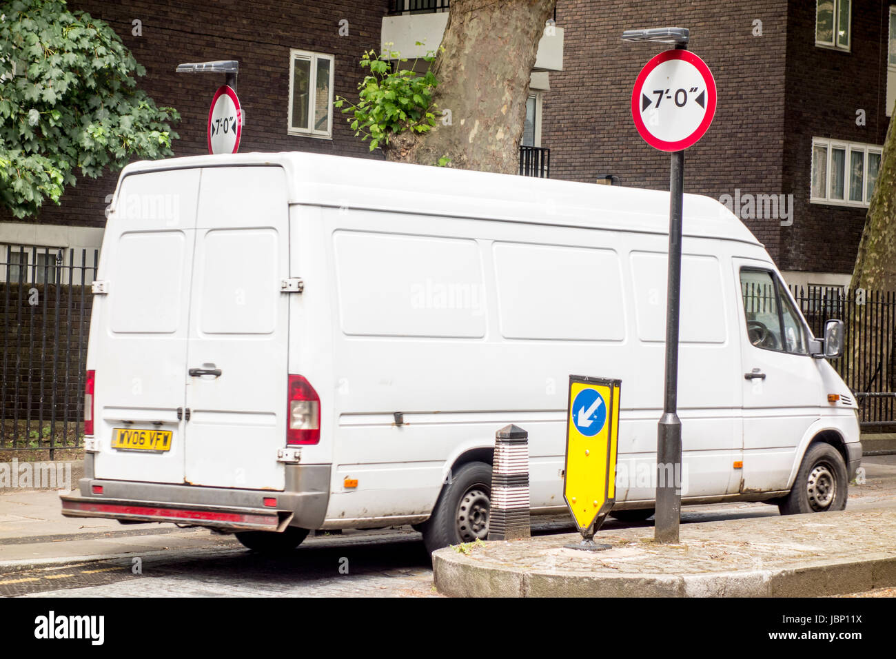 Van driving through 7’ / 7 feet wide traffic width restriction measure ...