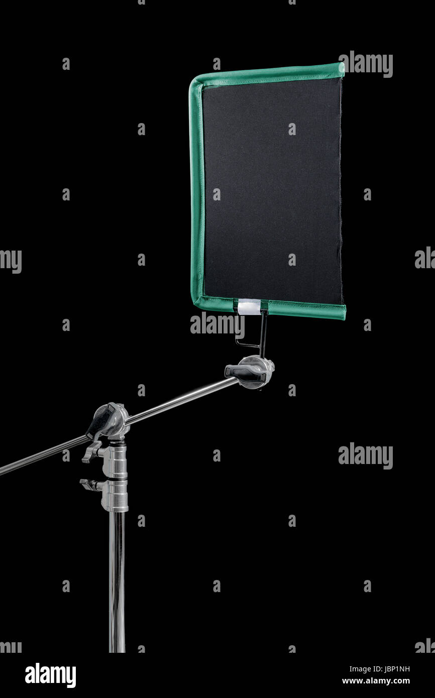 Film lighting equipment: A single scrim mounted on a c-stand Stock ...