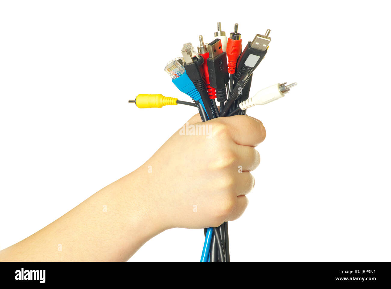 Computer cables in hand isolated on white background Stock Photo - Alamy