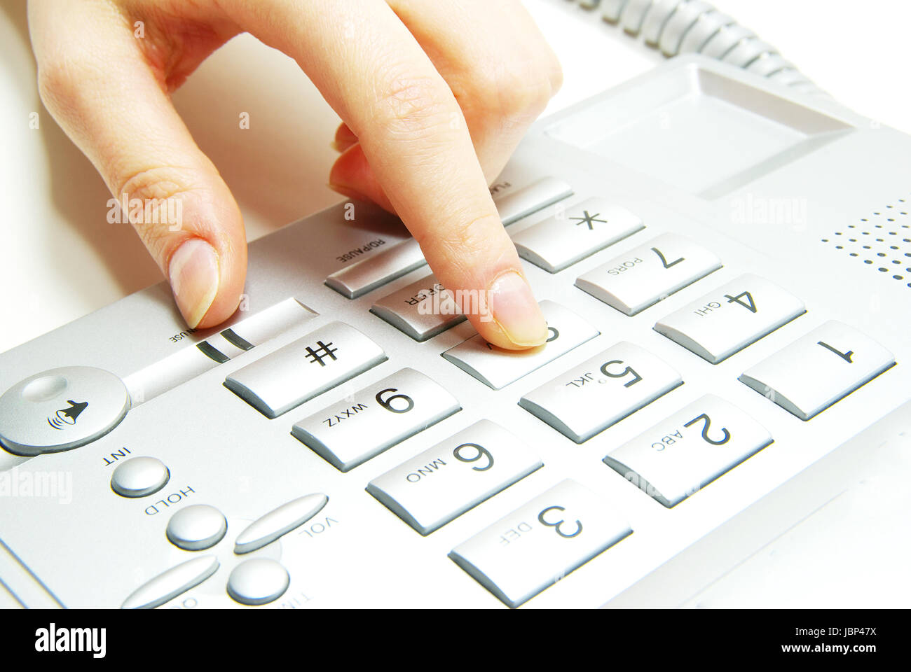 finger with grey telephone keypad Stock Photo - Alamy