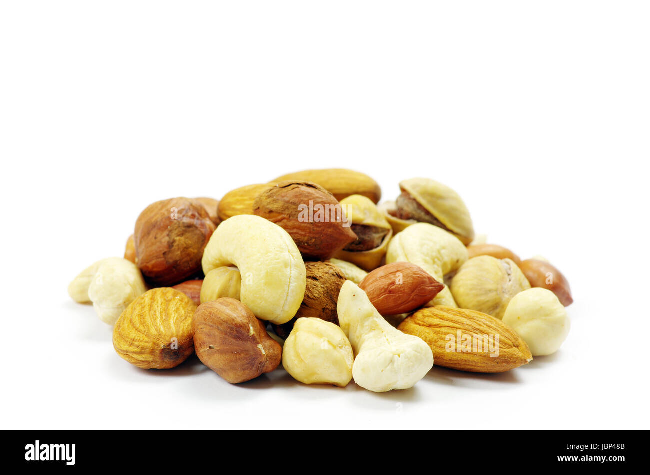 Assorted mixed nuts on white background Stock Photo - Alamy