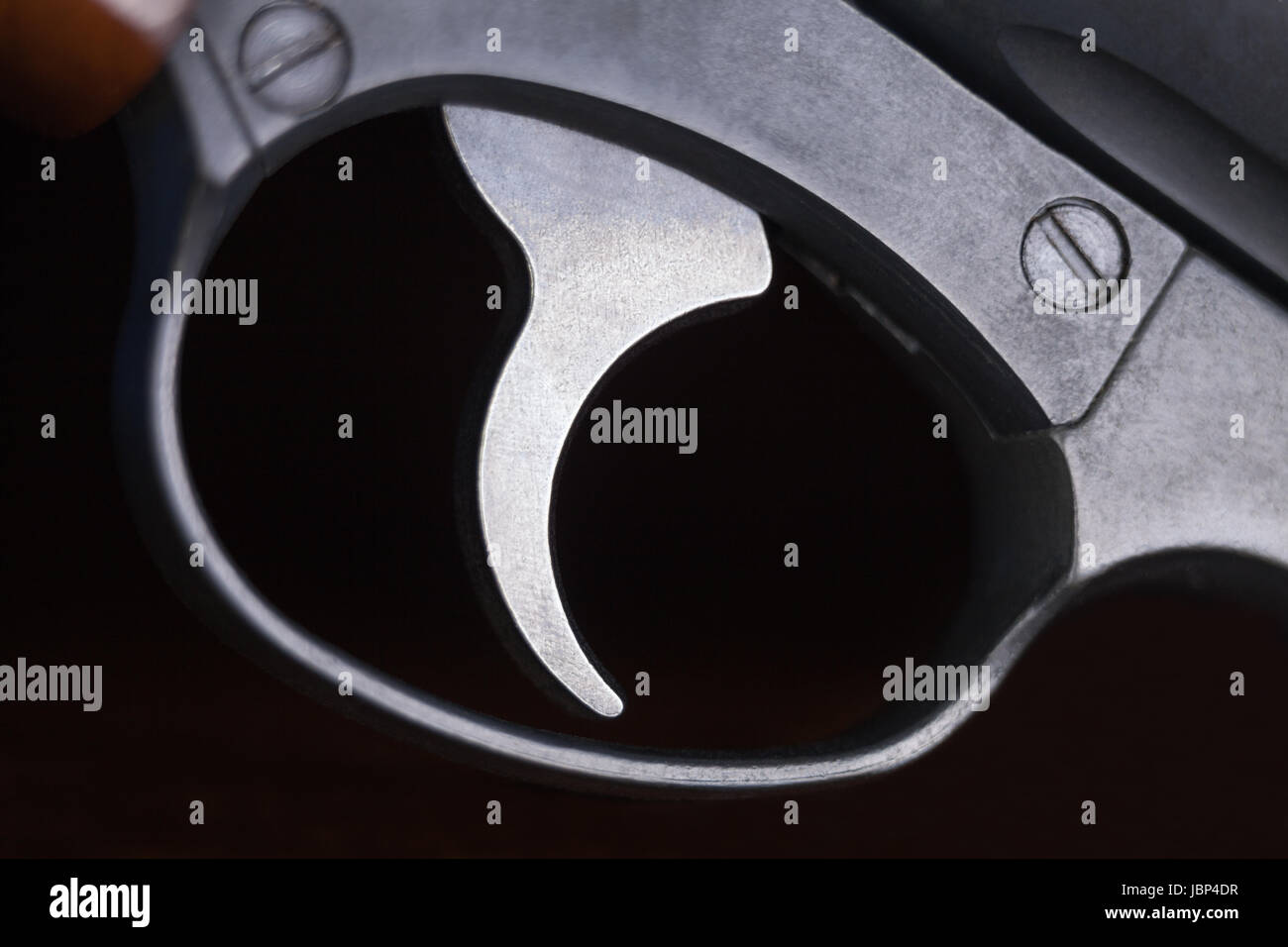 Macro of revolver gun trigger Stock Photo - Alamy