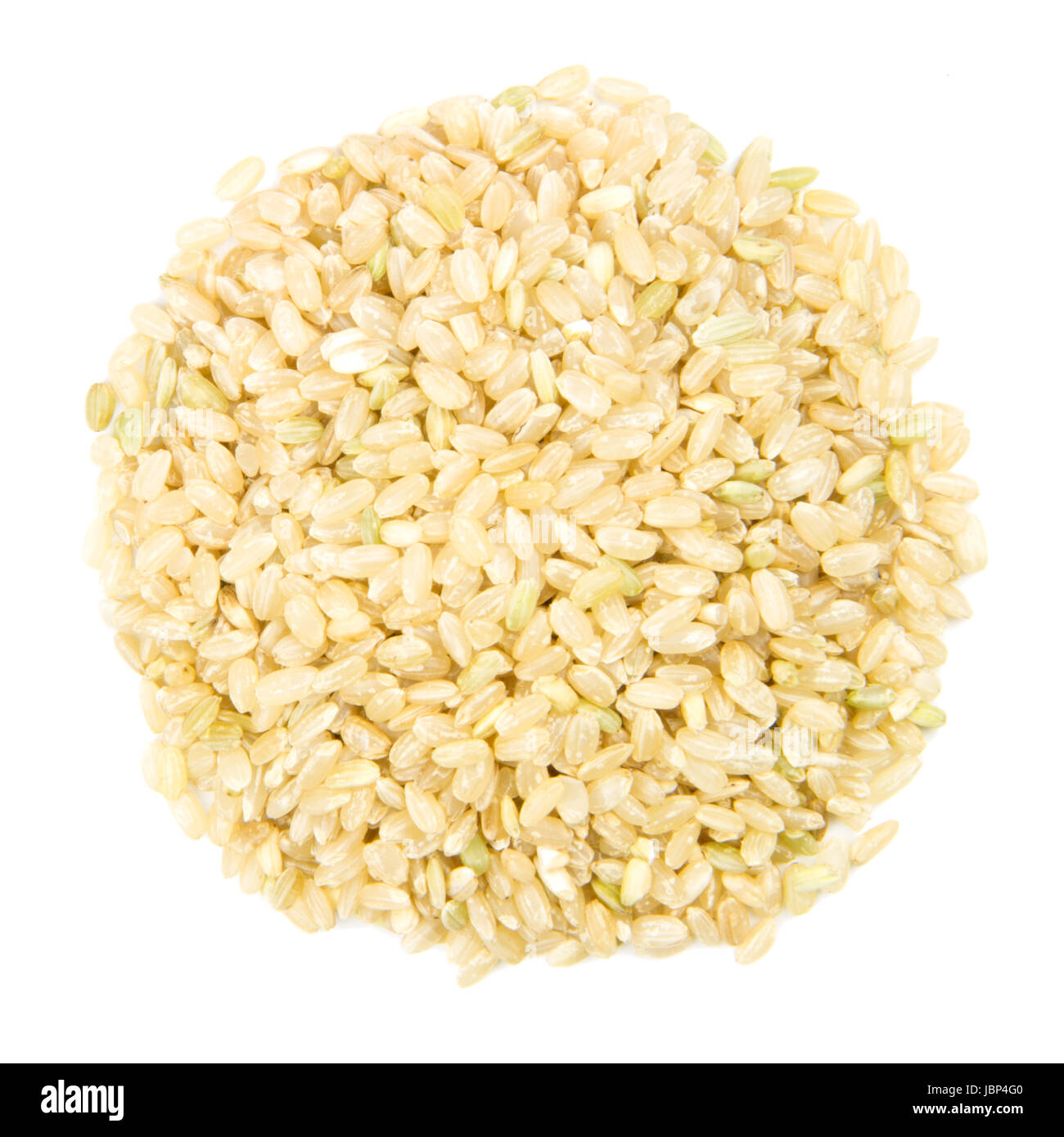 close up of brown rice isolated on white background Stock Photo - Alamy