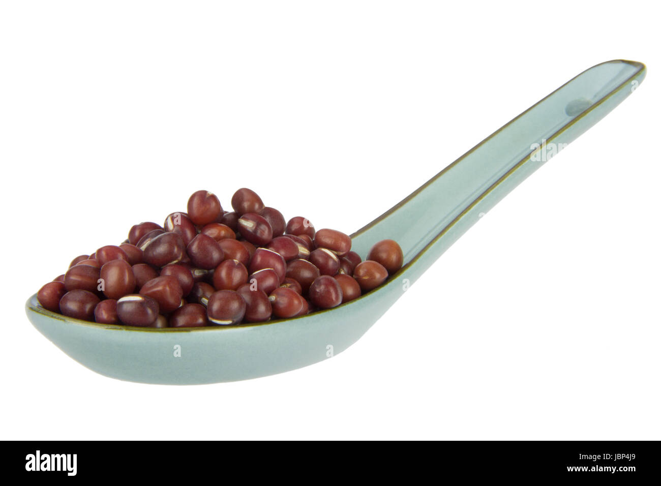 close up of red bean with china scoop isolated on white background ...
