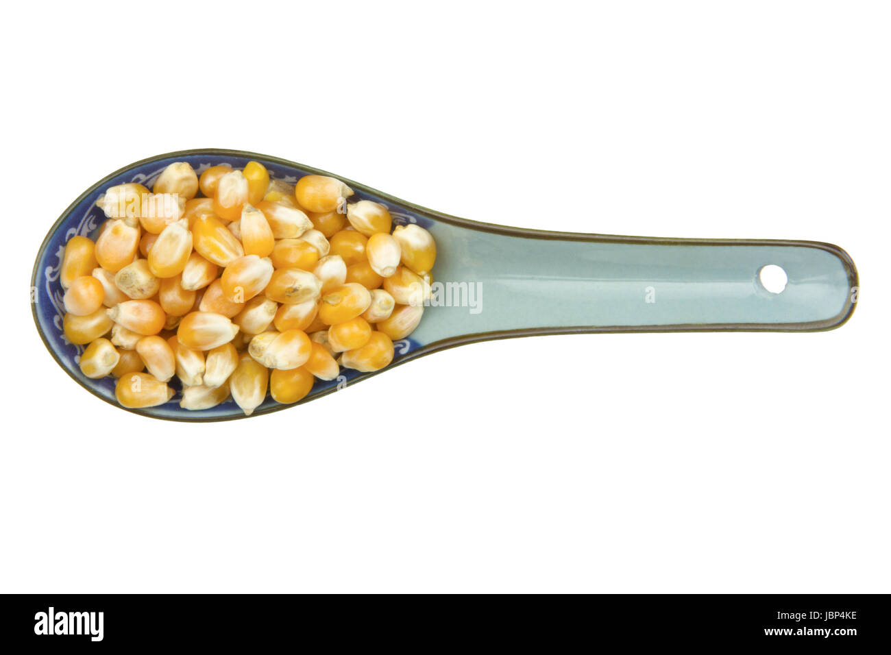 close up of corn with china scoop isolated on white background Stock ...