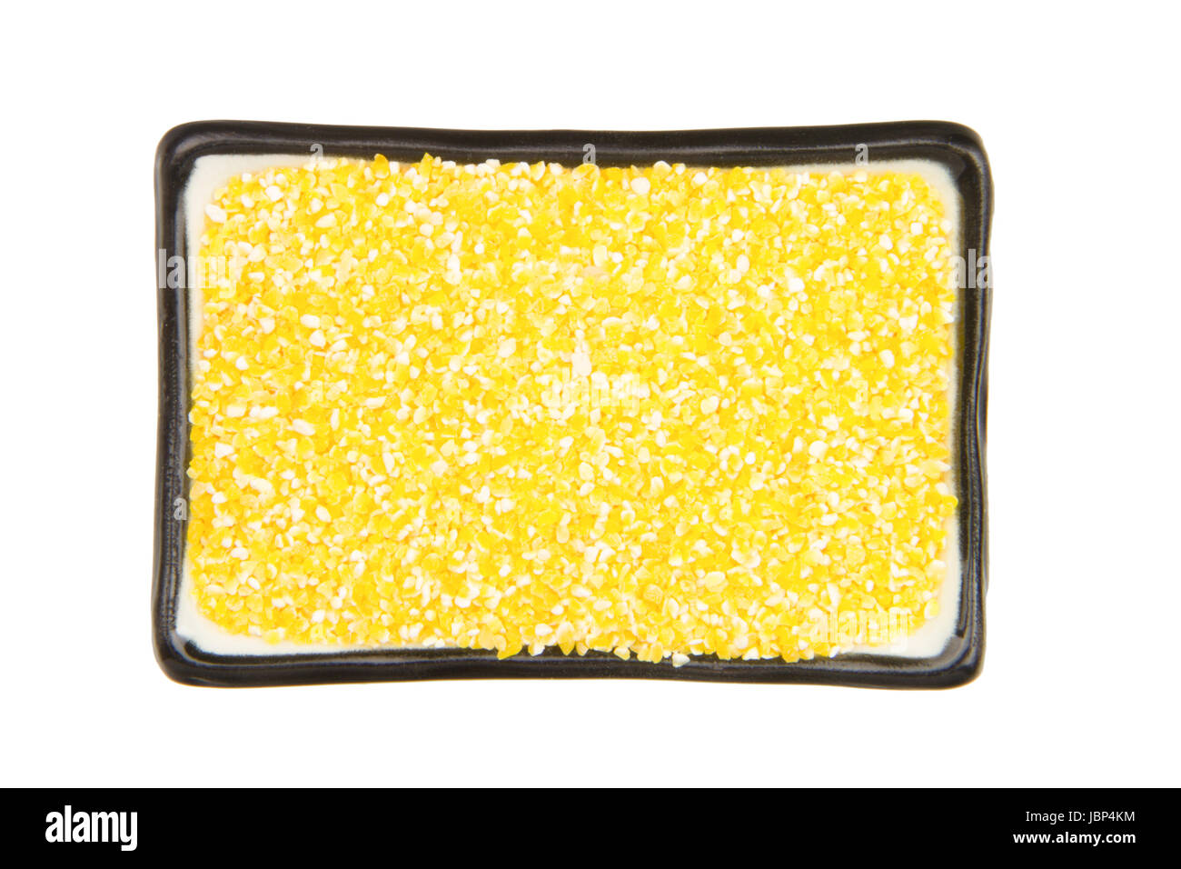 close up corn grit with china bowl isolated on white background Stock ...