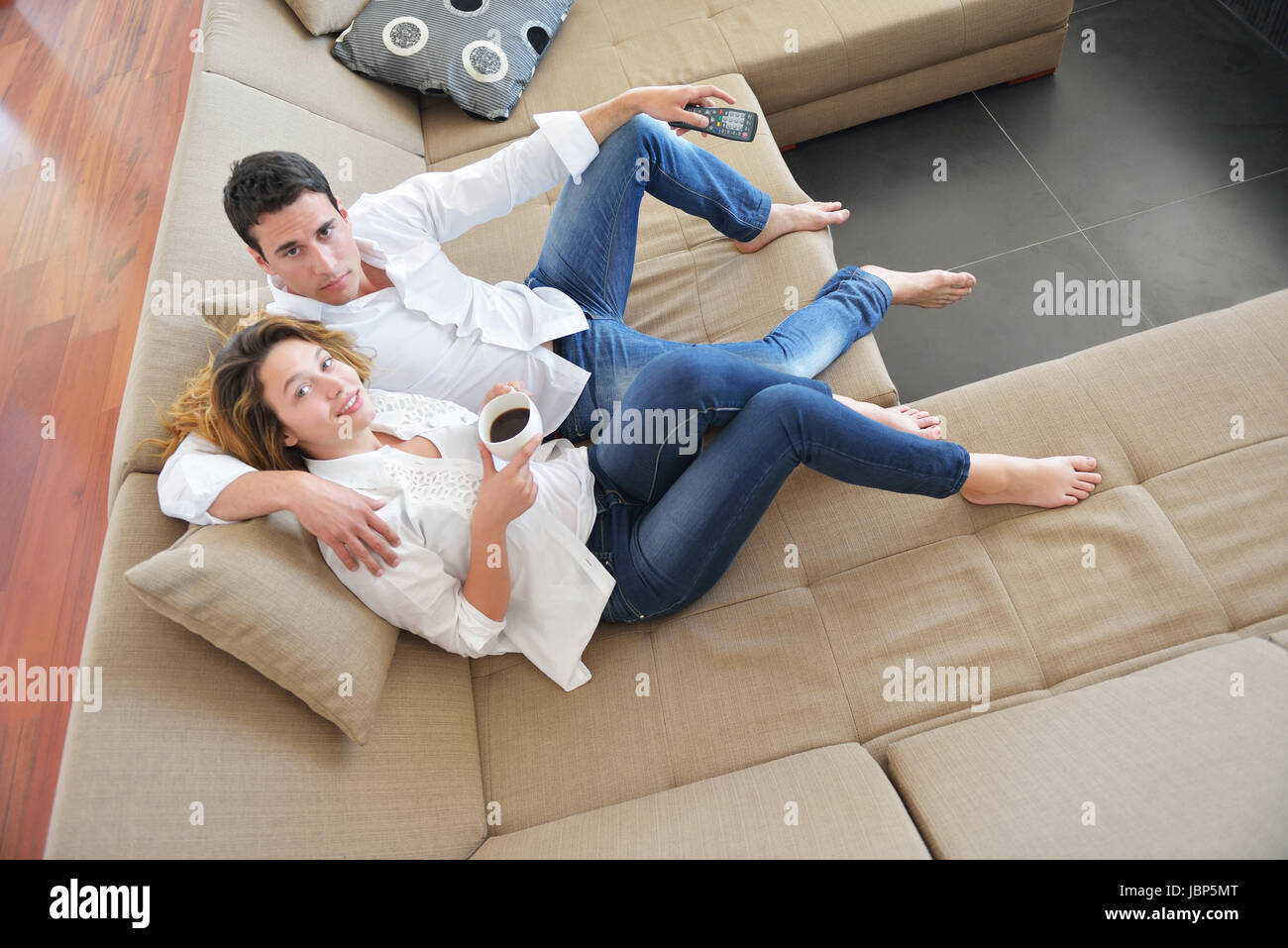 romantic happy young couple relax at home Stock Photo - Alamy