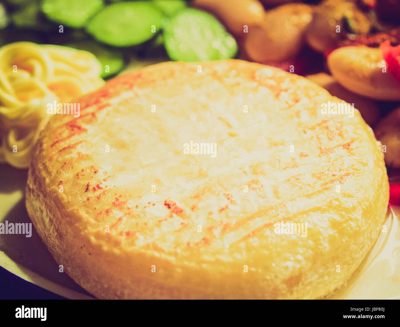 Vintage retro looking Baked cheese picture Stock Photo - Alamy