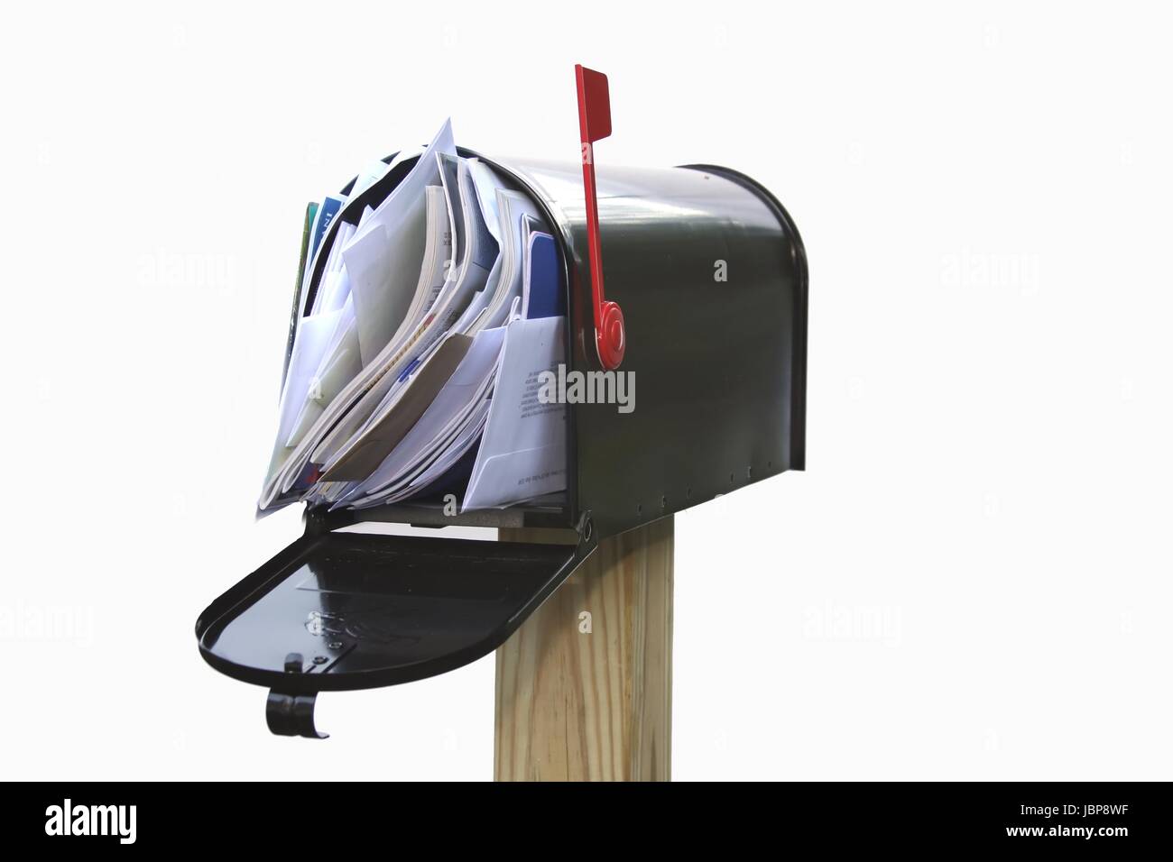 Mail box overflowing with mail, bills, junk mail, e-mails and other ...