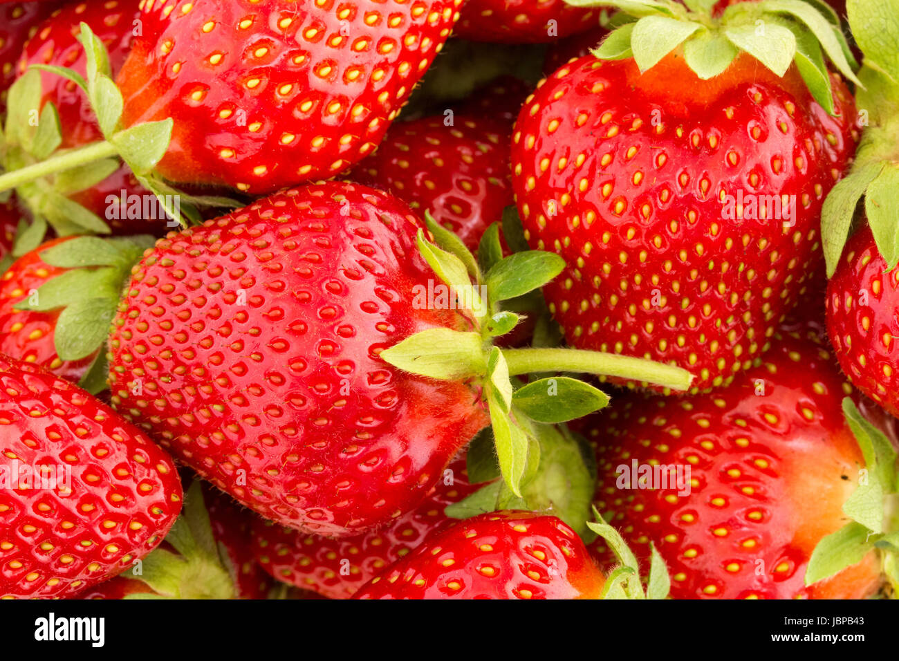 Close up of fresh strawberry - Food frame background Stock Photo - Alamy