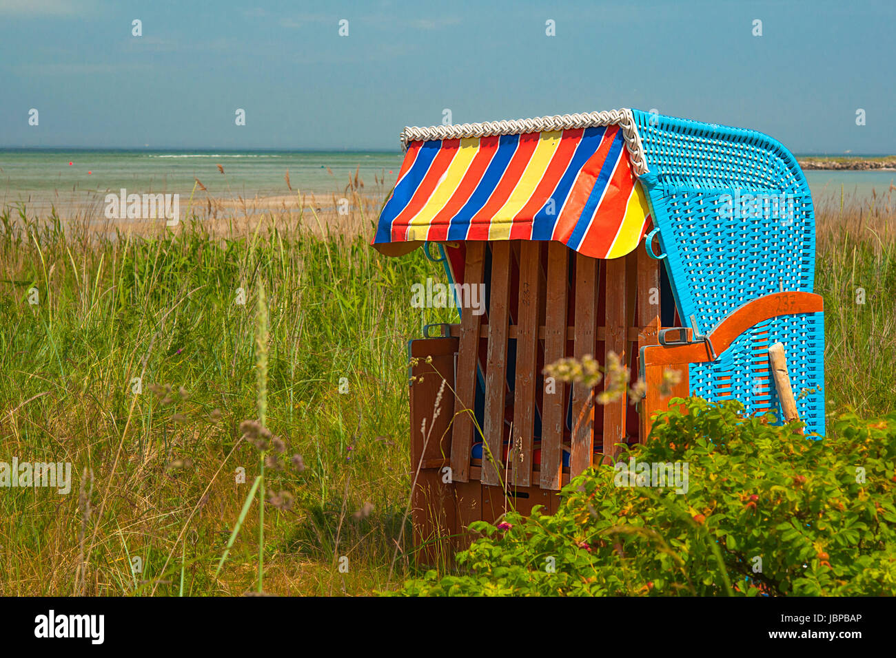 beach chair tear Stock Photo - Alamy