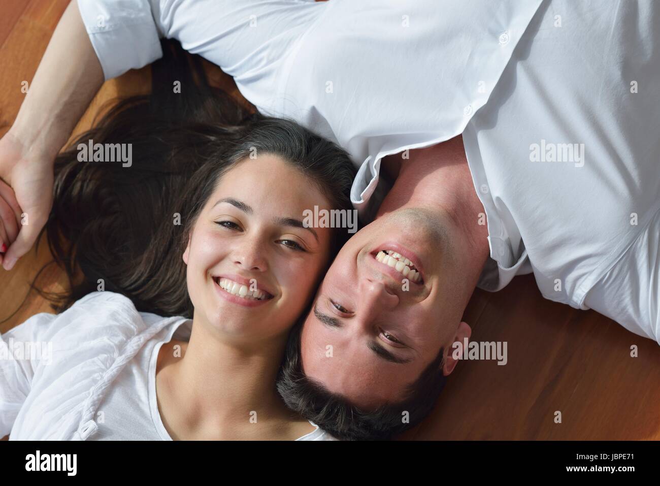 romantic happy young couple relax at home Stock Photo - Alamy