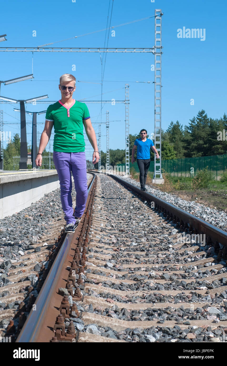 Two young guys walking on hi-res stock photography and images - Alamy