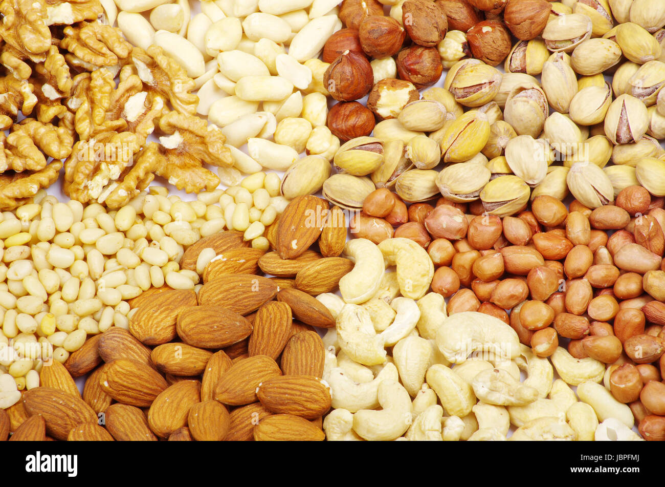 nuts collection isolated on background Stock Photo - Alamy